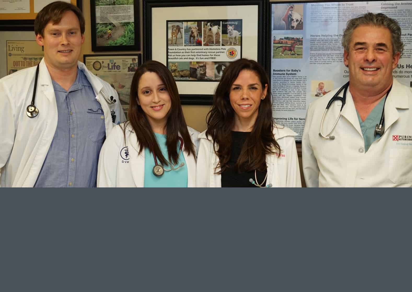 A Group Of Doctors Posing For A Photo. | Beyond Pets Animal Hospital